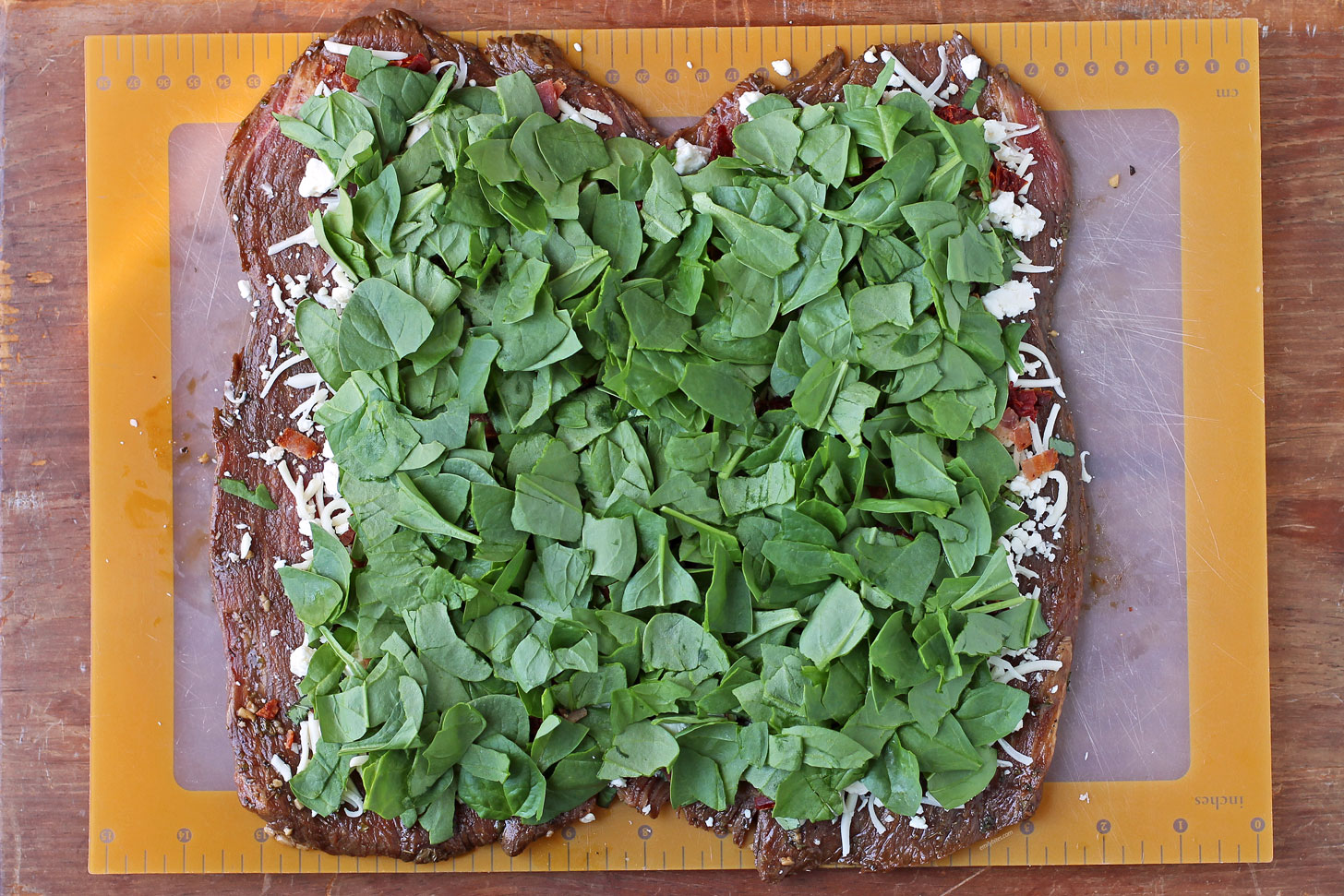 Stuffed Balsamic Flank Steak Pinwheels - Emily Bites