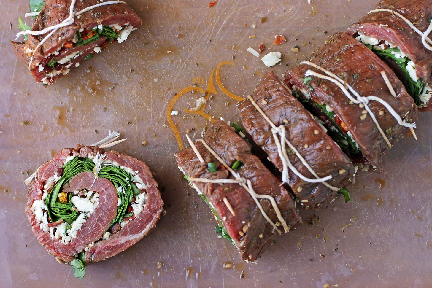 Stuffed Balsamic Flank Steak Pinwheels - Emily Bites