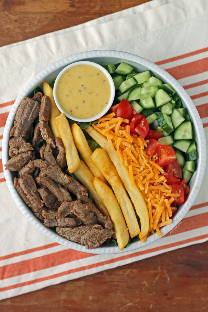 Pittsburgh Steak Salad with Warm Riviera Dressing - Emily Bites